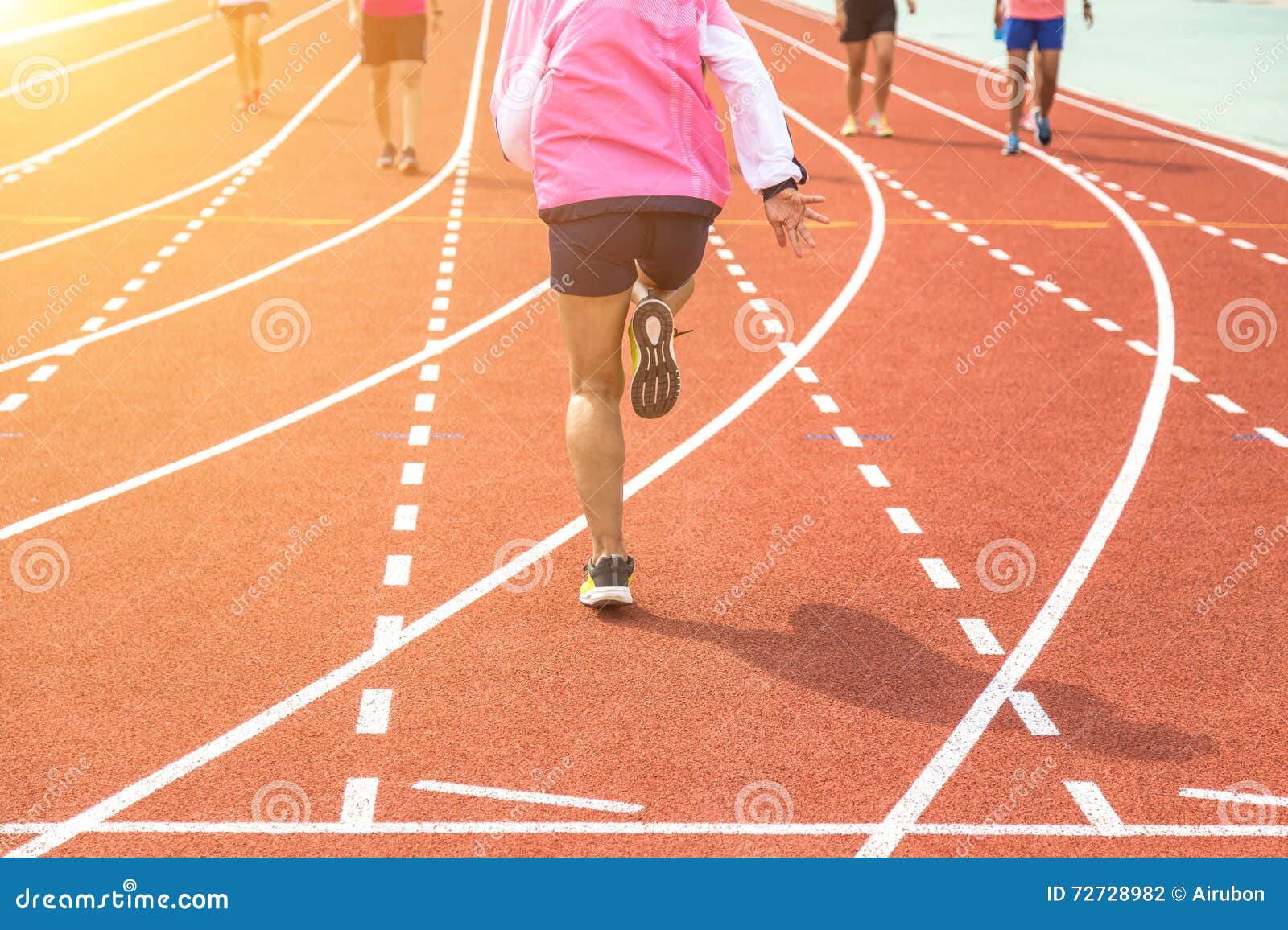 Athlete Warm Up on Running Track at the Stadium Stock Photo - Image of ...