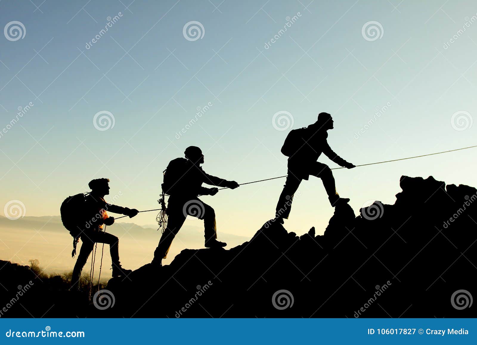 Athletes Climbing Safely with Rope Stock Image - Image of athletes ...