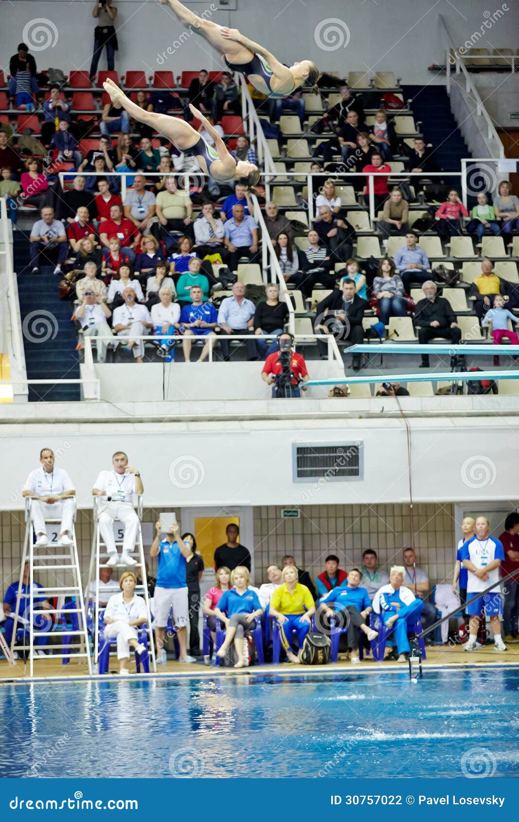 Athletes during Competitions on Syncronized Springboard Diving ...