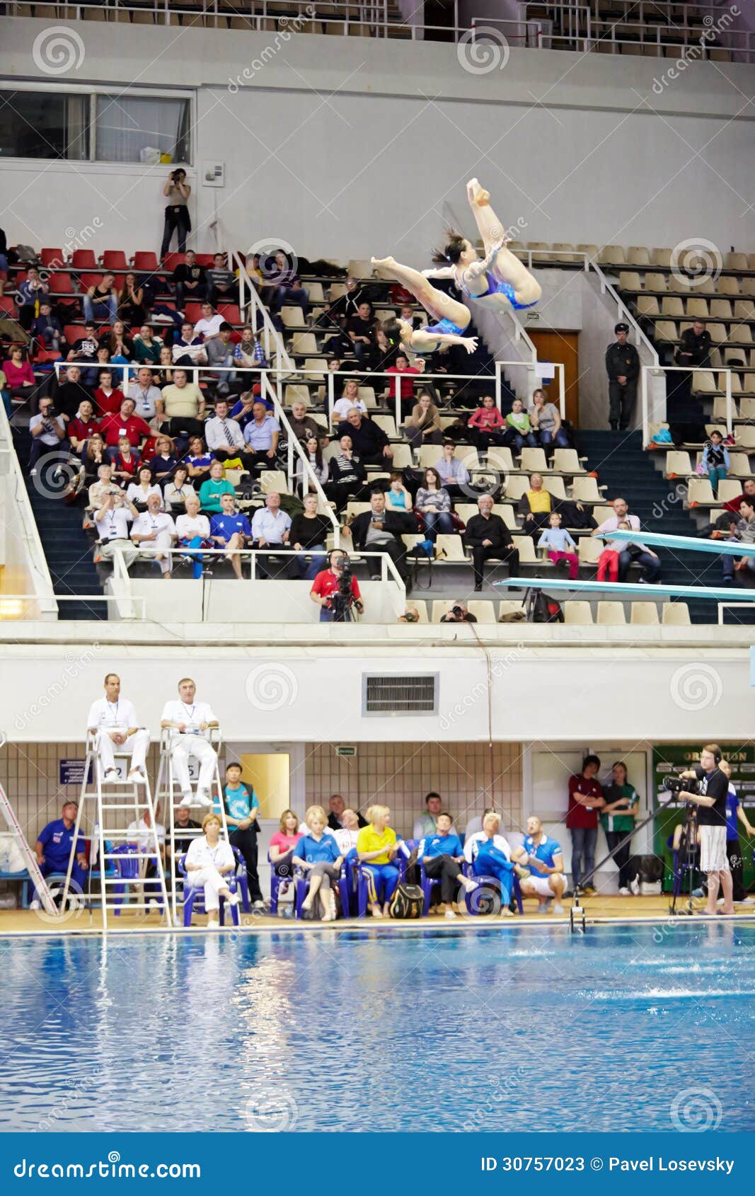 Athletes during Competitions on Syncronized Springboard Diving ...