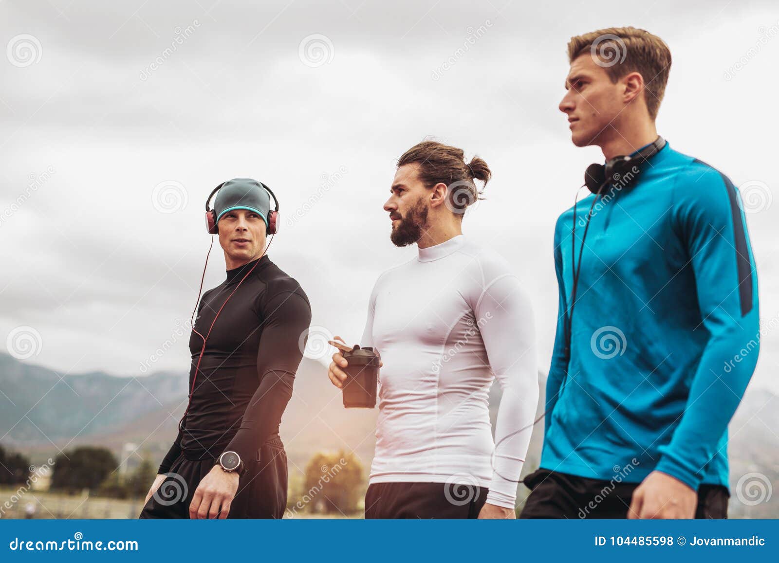 Athletes Practicing a Run on Athletics Stadium Track. Stock Photo ...