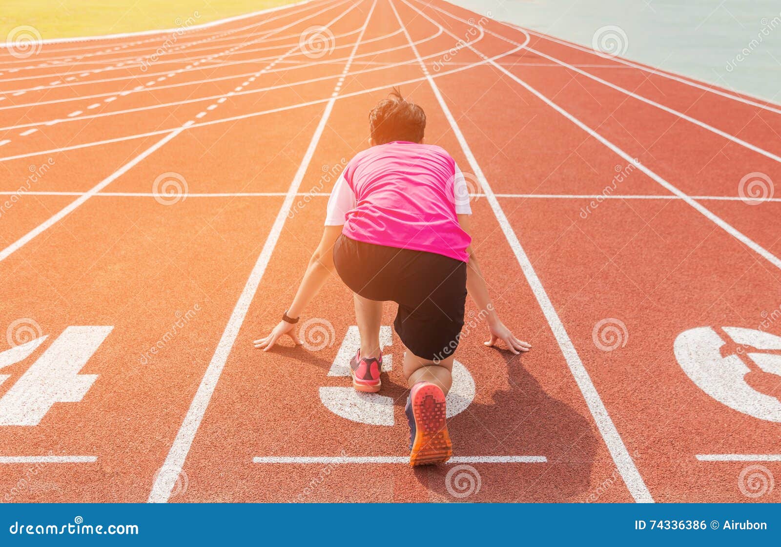 Athletes Preparing for Race on Starting Blocks. Stock Photo - Image of ...