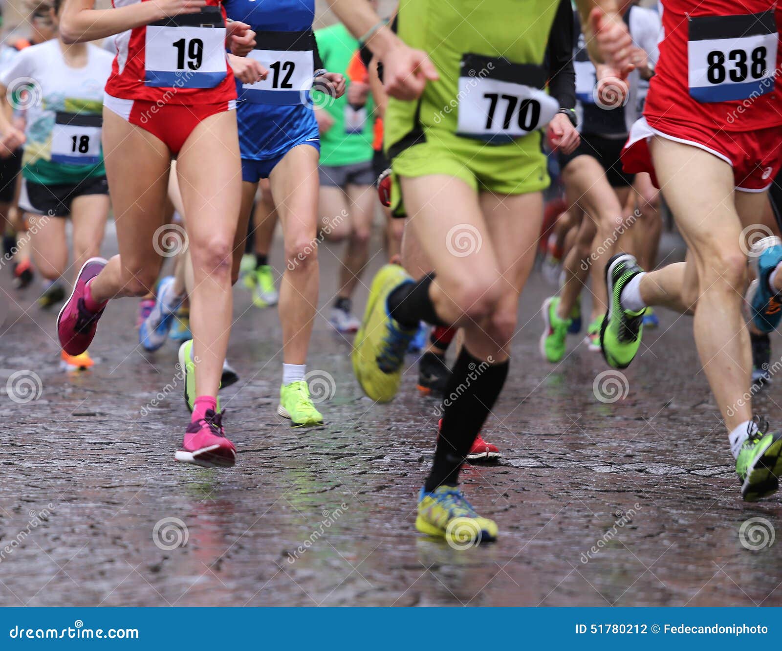 Athletes RUNS during the Rainy Marathon Stock Photo - Image of contest ...