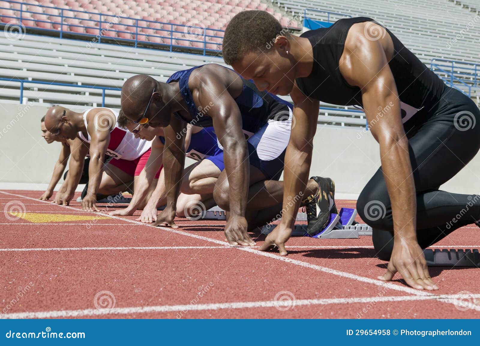Track Runners At The Starting Line