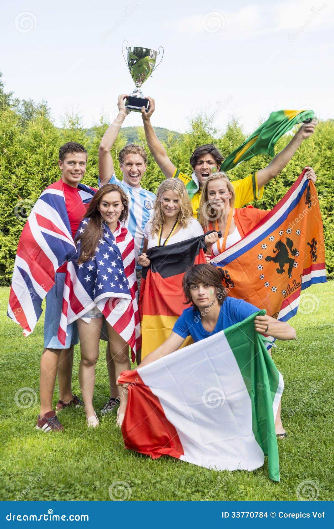 Athletes with Various National Flags Celebrating in Park Stock Photo ...