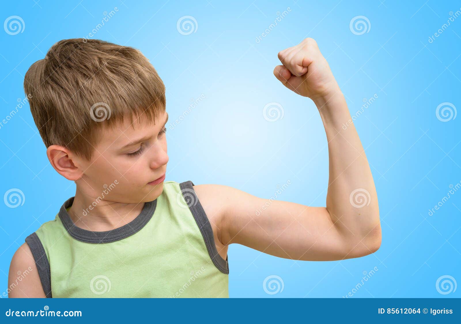 Athletic Boy Looking at the Biceps Muscle Stock Photo - Image of shape ...
