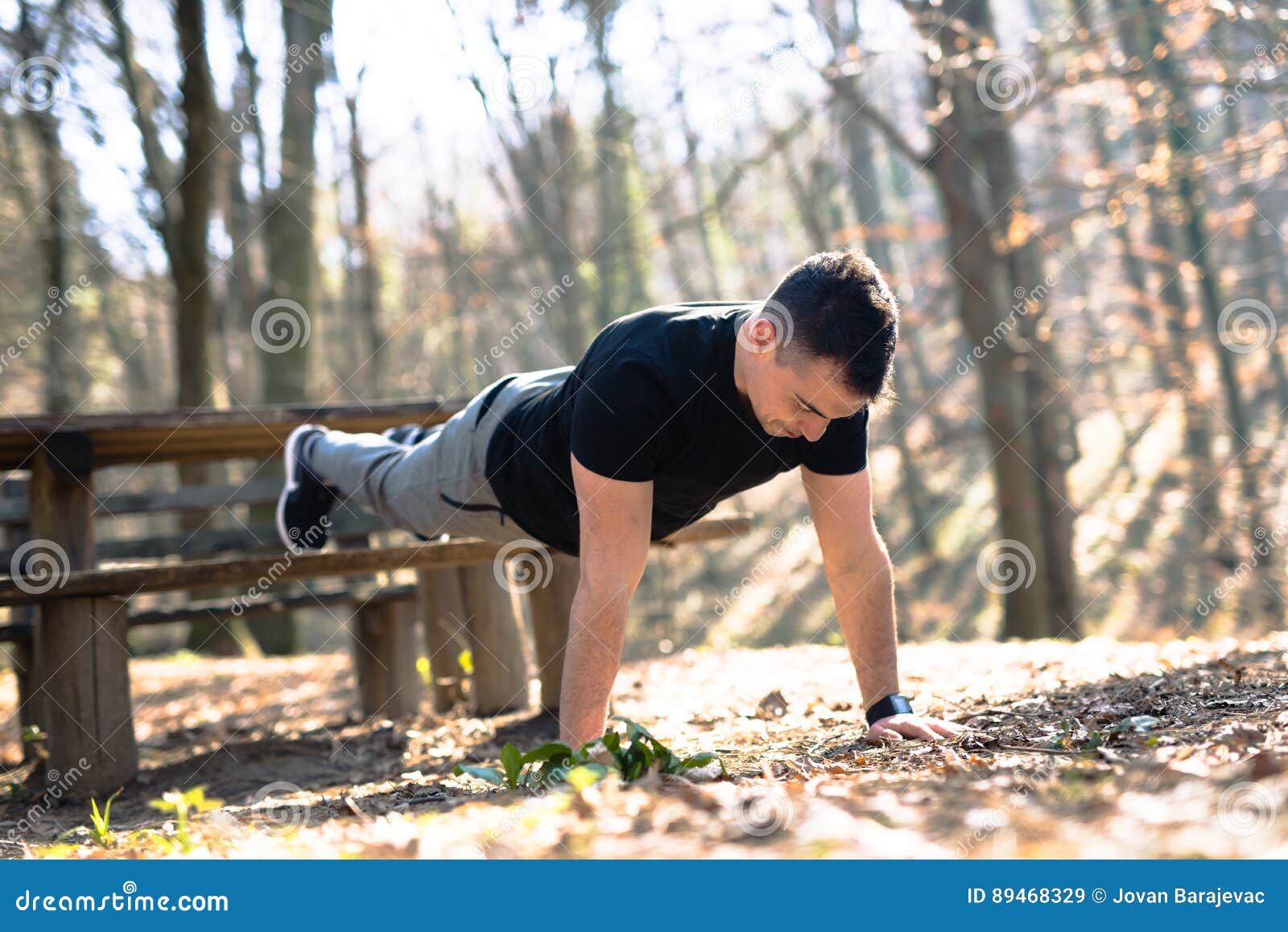 Athletic Built Man Doing Pushups and Core Training in Park Stock Image ...