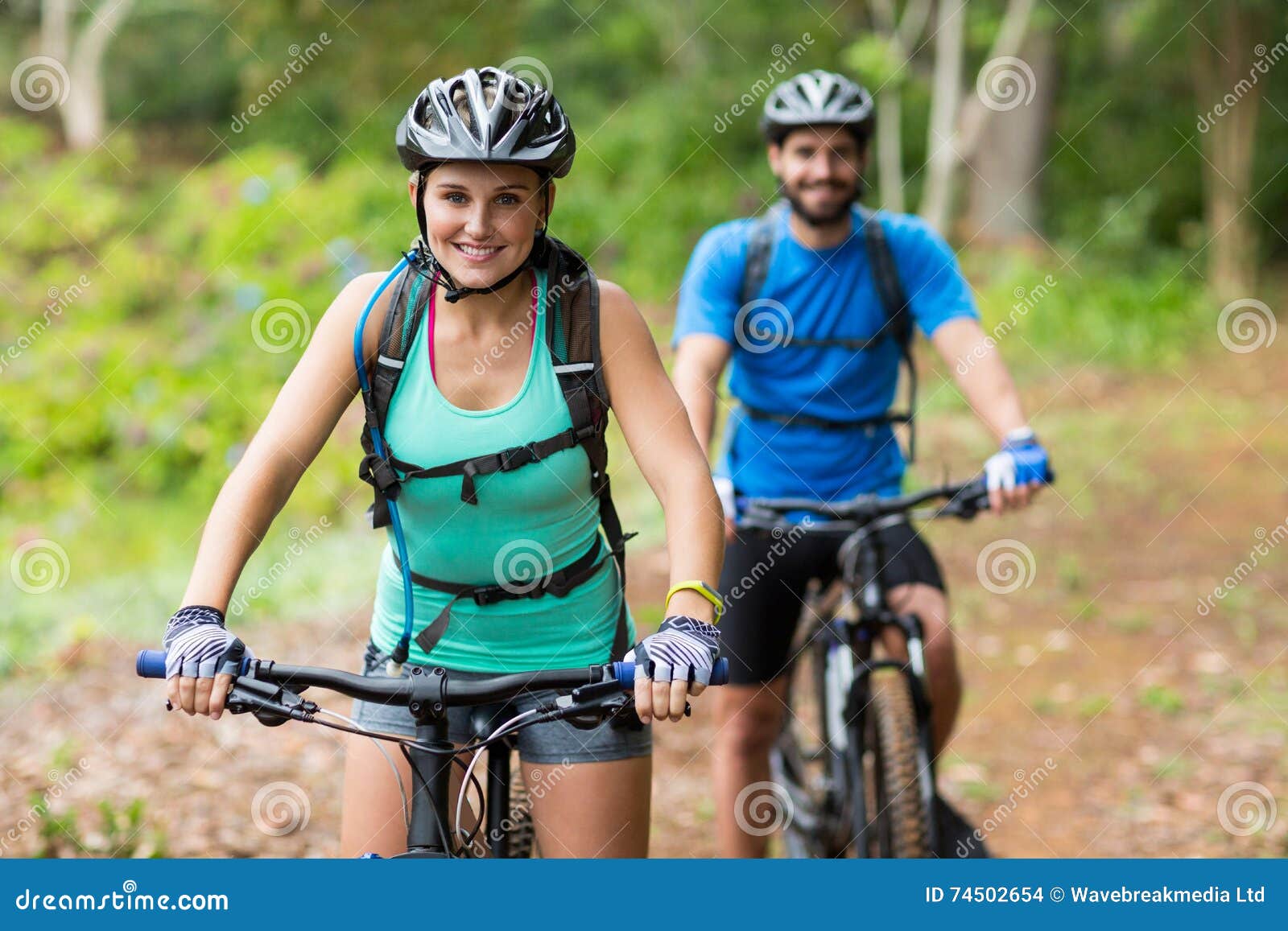 Athletic Couple Cycling in Forest Stock Photo - Image of handsome ...
