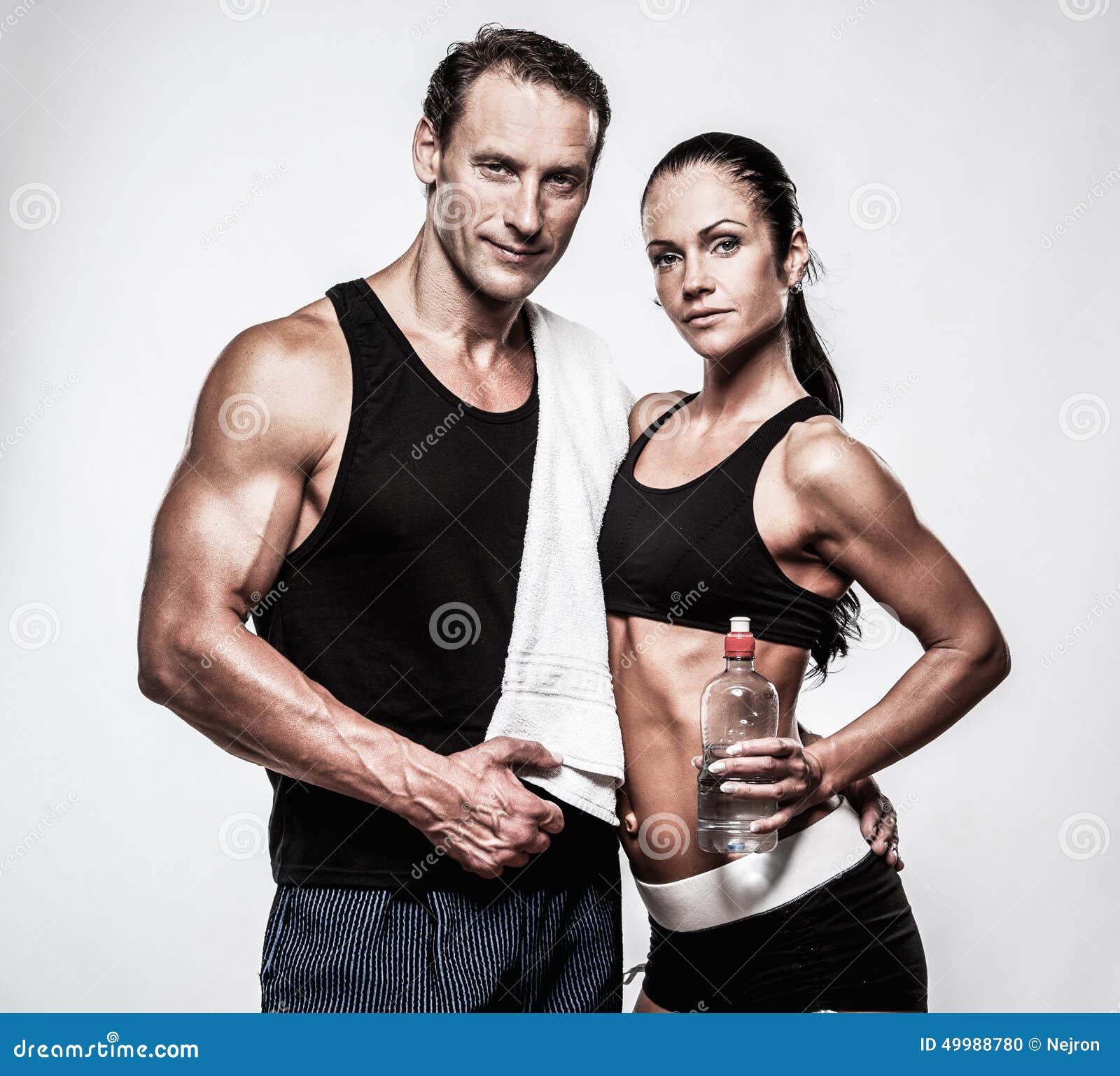 Athletic couple stock photo. Image of body, energy, bodybuilding - 49988780