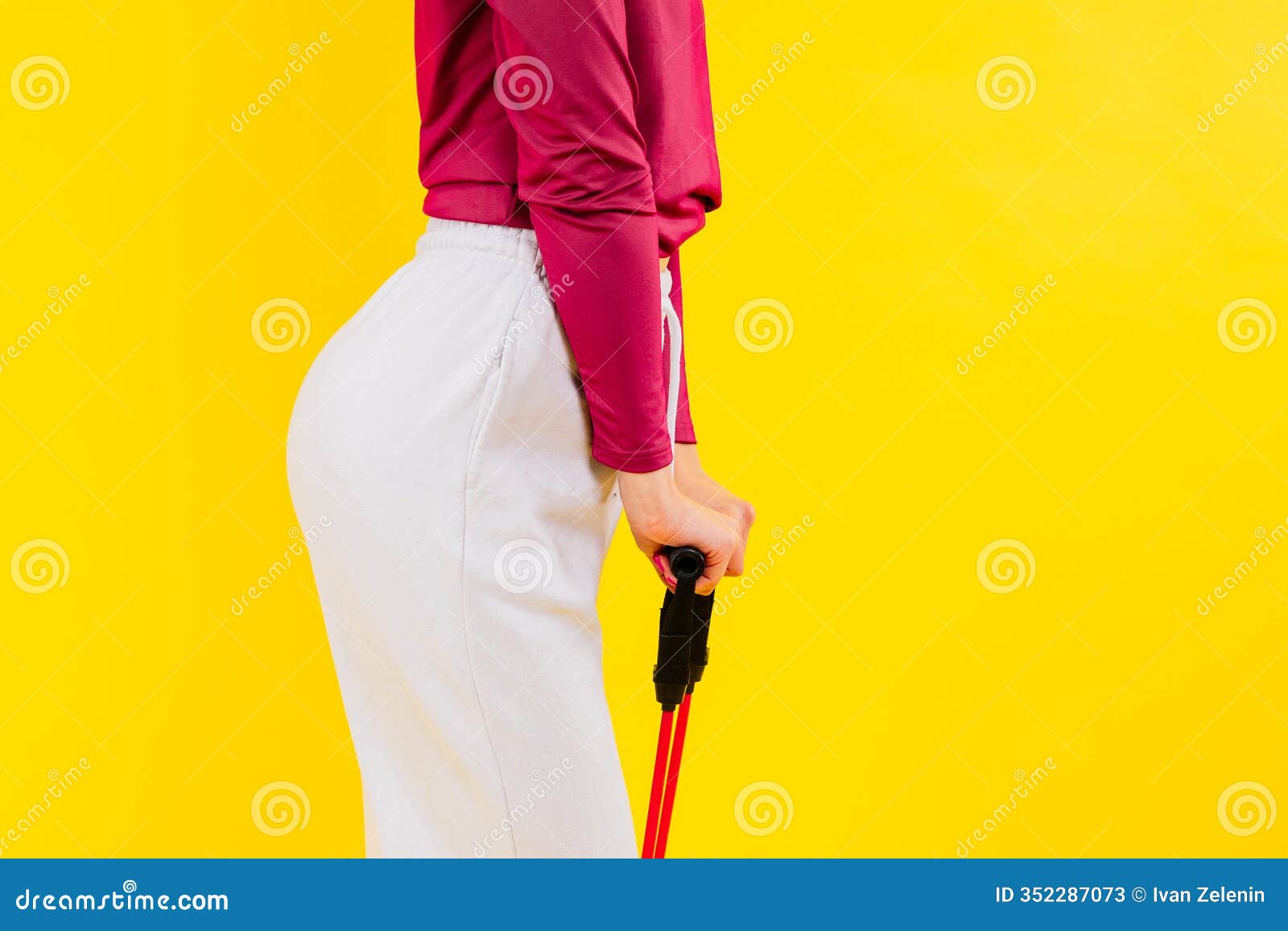 Athletic Female Performs Exercises Using a Resistance Band. Strength ...