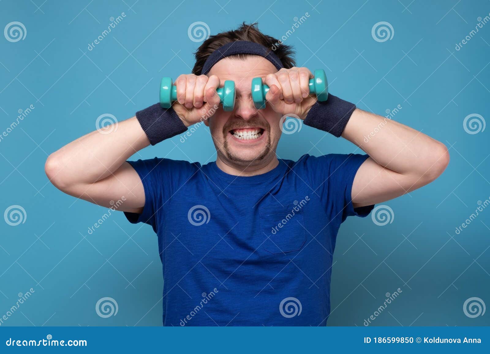 Athletic Funny Young Man Doing Exercise Dumbbell Stock Photo - Image of ...
