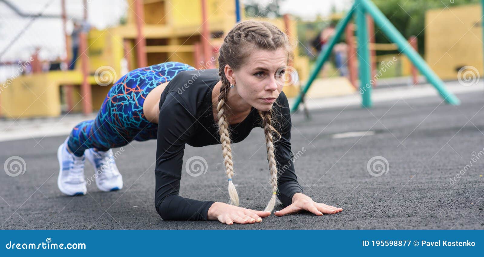 Athletic Girl Doing the Plank on the Playground. Stock Image - Image of ...