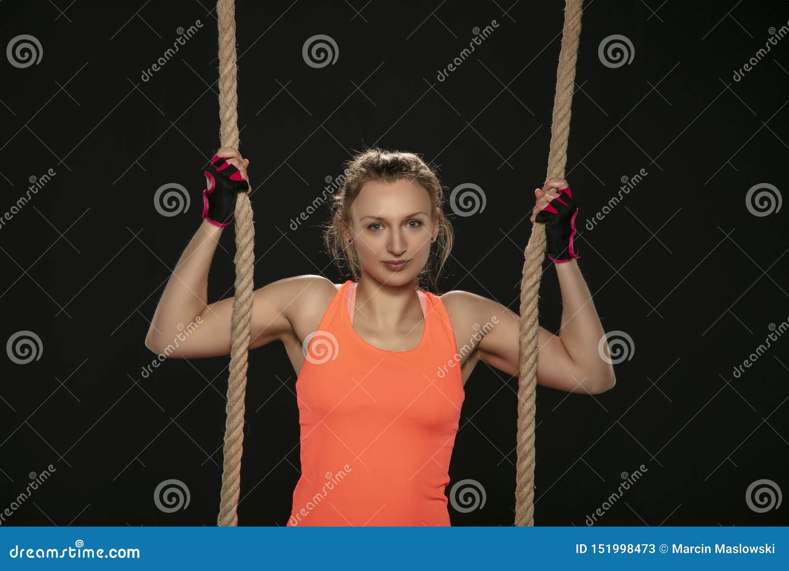 Athletic Girl Exercising with a Thick Rope Stock Image - Image of ...