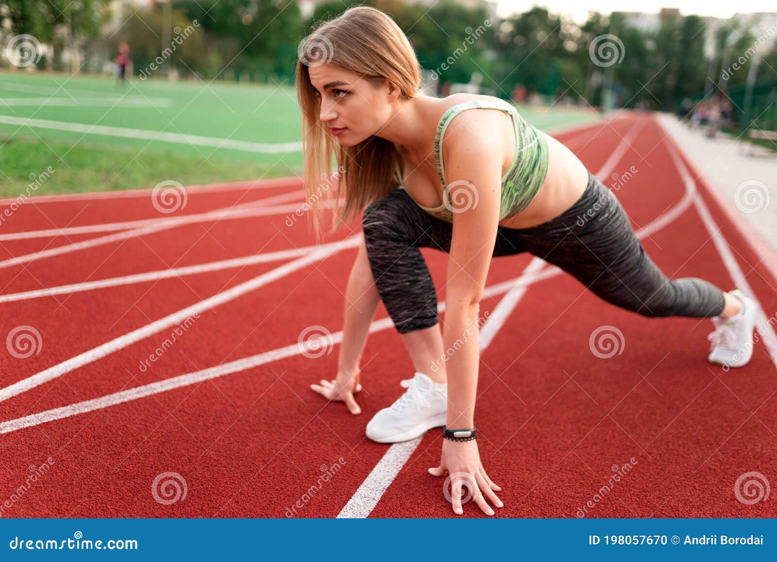 Athletic Girl at Low Start Getting Ready To Run. Stock Photo - Image of ...