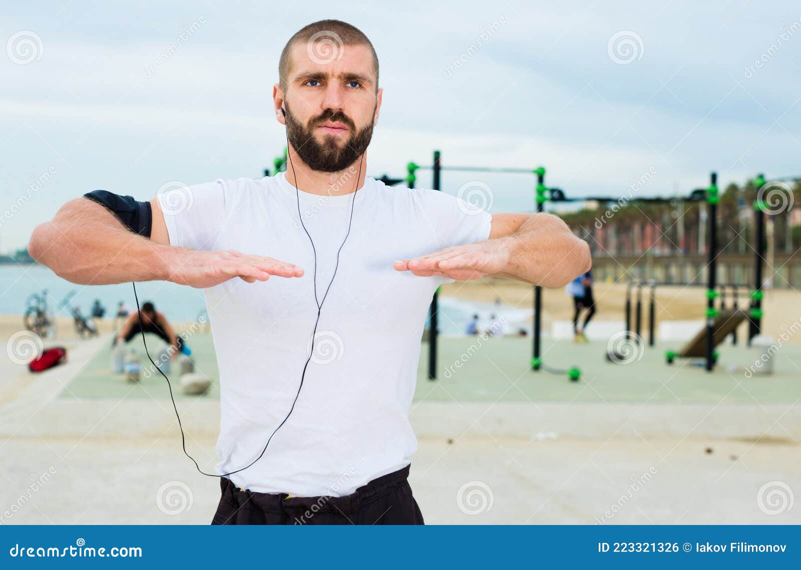 Warming up young man stock photo. Image of palm, working - 223321326