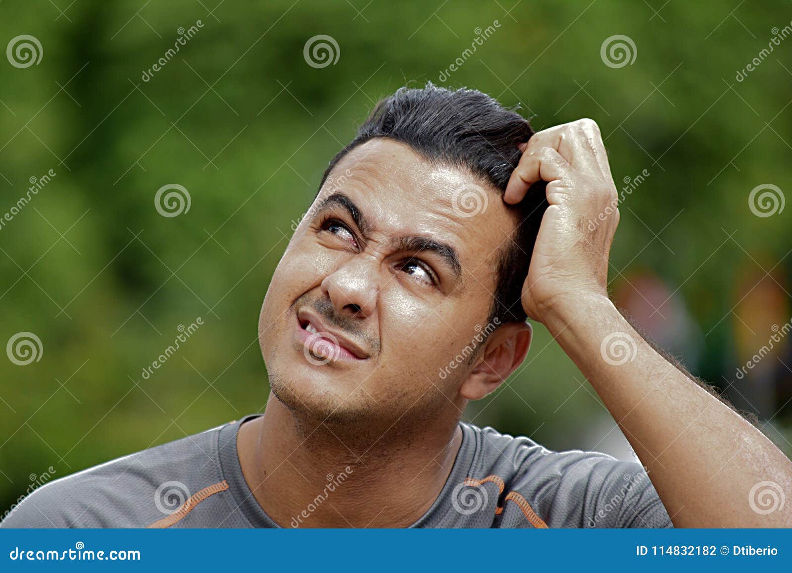 Athletic Man and Confusion stock photo. Image of thinking - 114832182