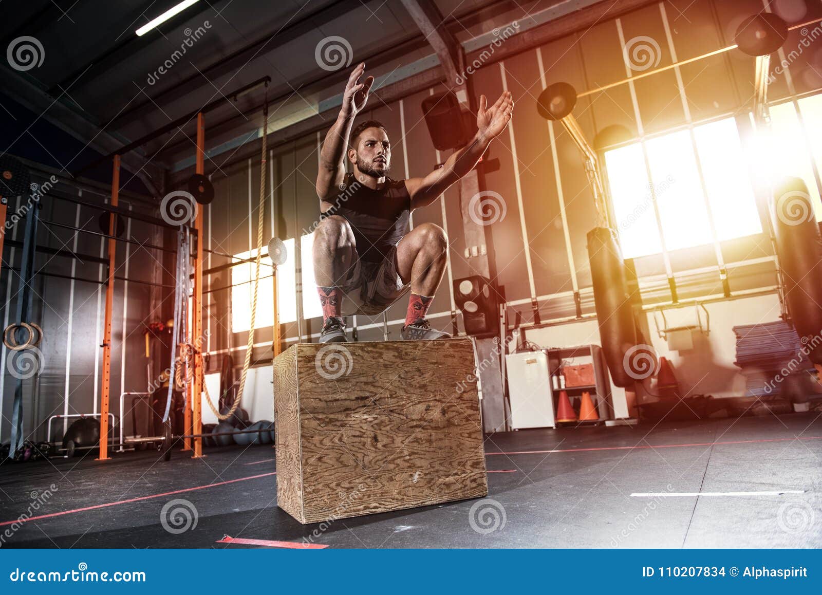 Athletic Man Does Box Jump Exercises at the Gym Stock Photo - Image of ...