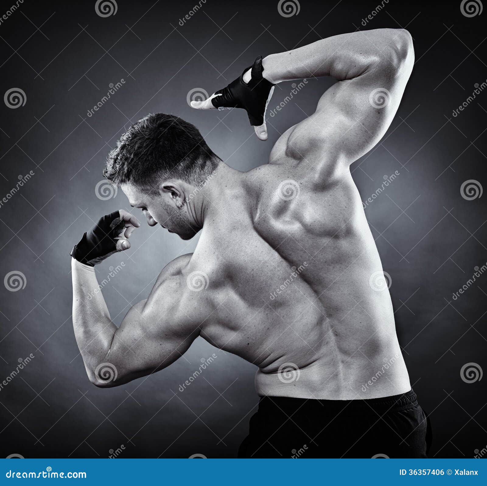 Athletic Man Doing Bodybuilding Moves Stock Photo - Image of athlete ...