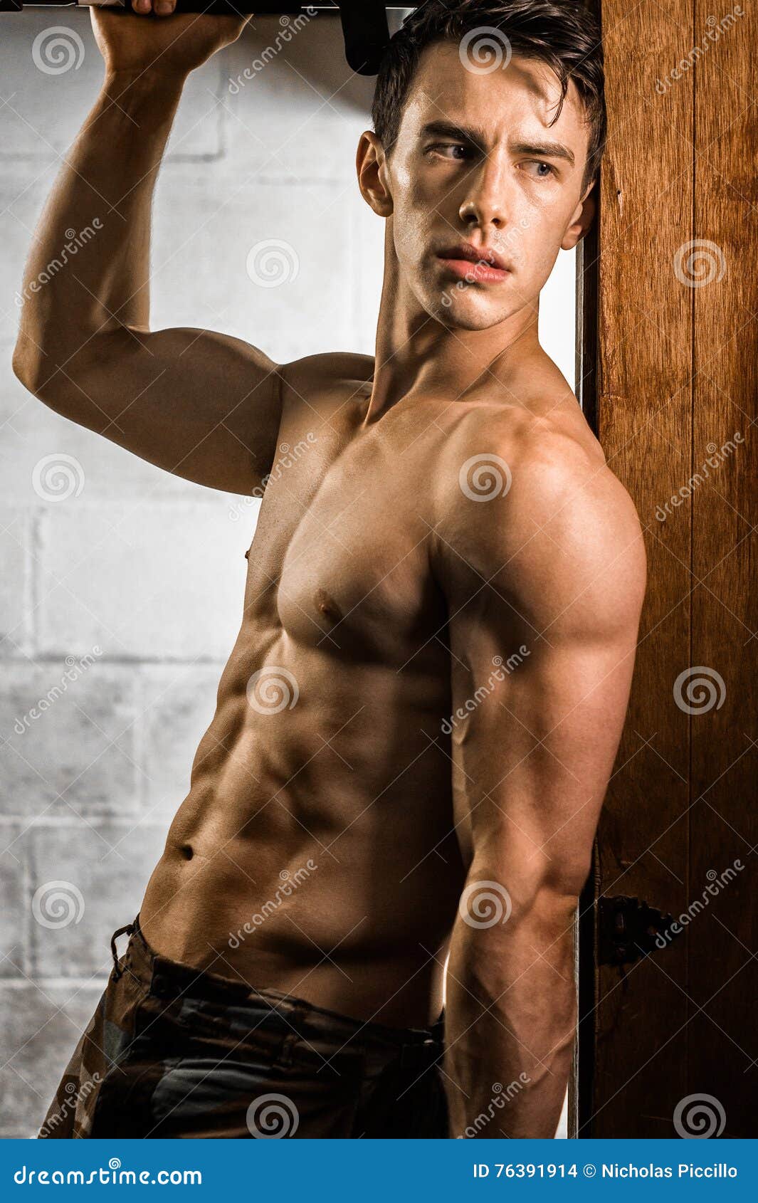 Athletic Man Flexing stock photo. Image of camp, exercise - 76391914