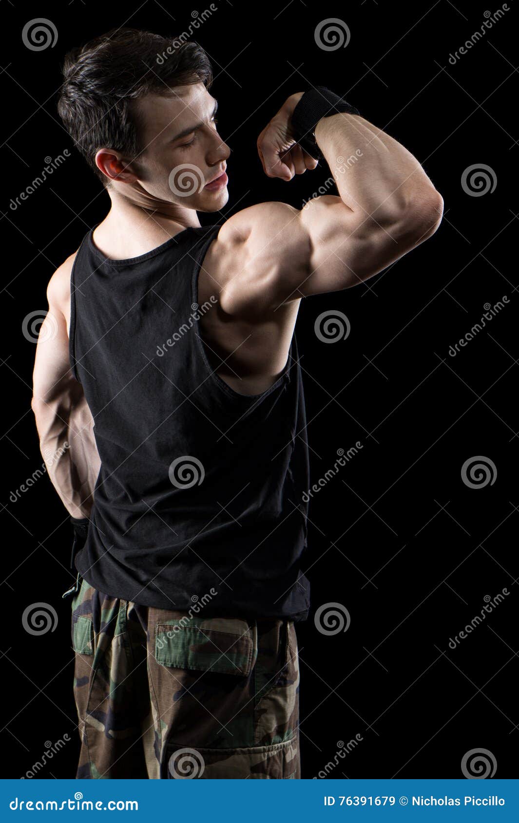 Athletic Man Flexing stock image. Image of shot, shape - 76391679