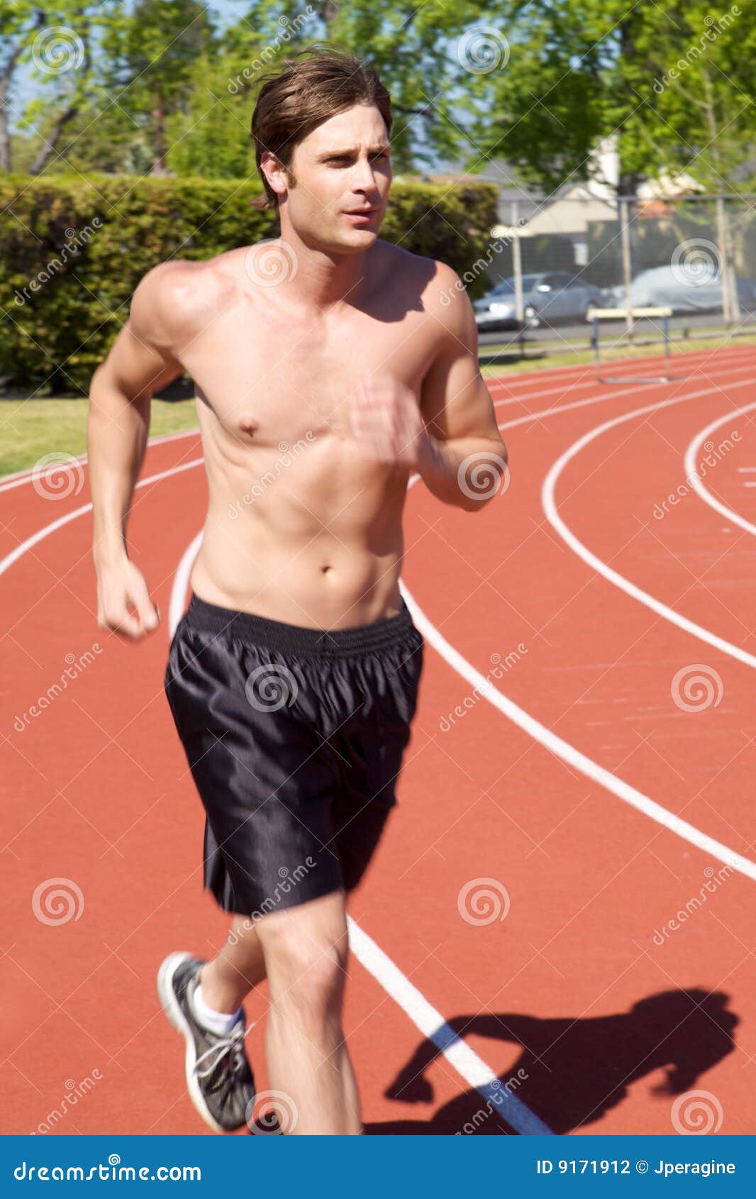 Athletic Man Jogging stock photo. Image of practicing - 9171912