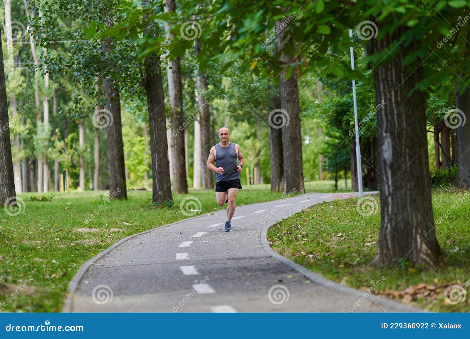 Marathon Runner Training in the Park Stock Photo - Image of jogging ...