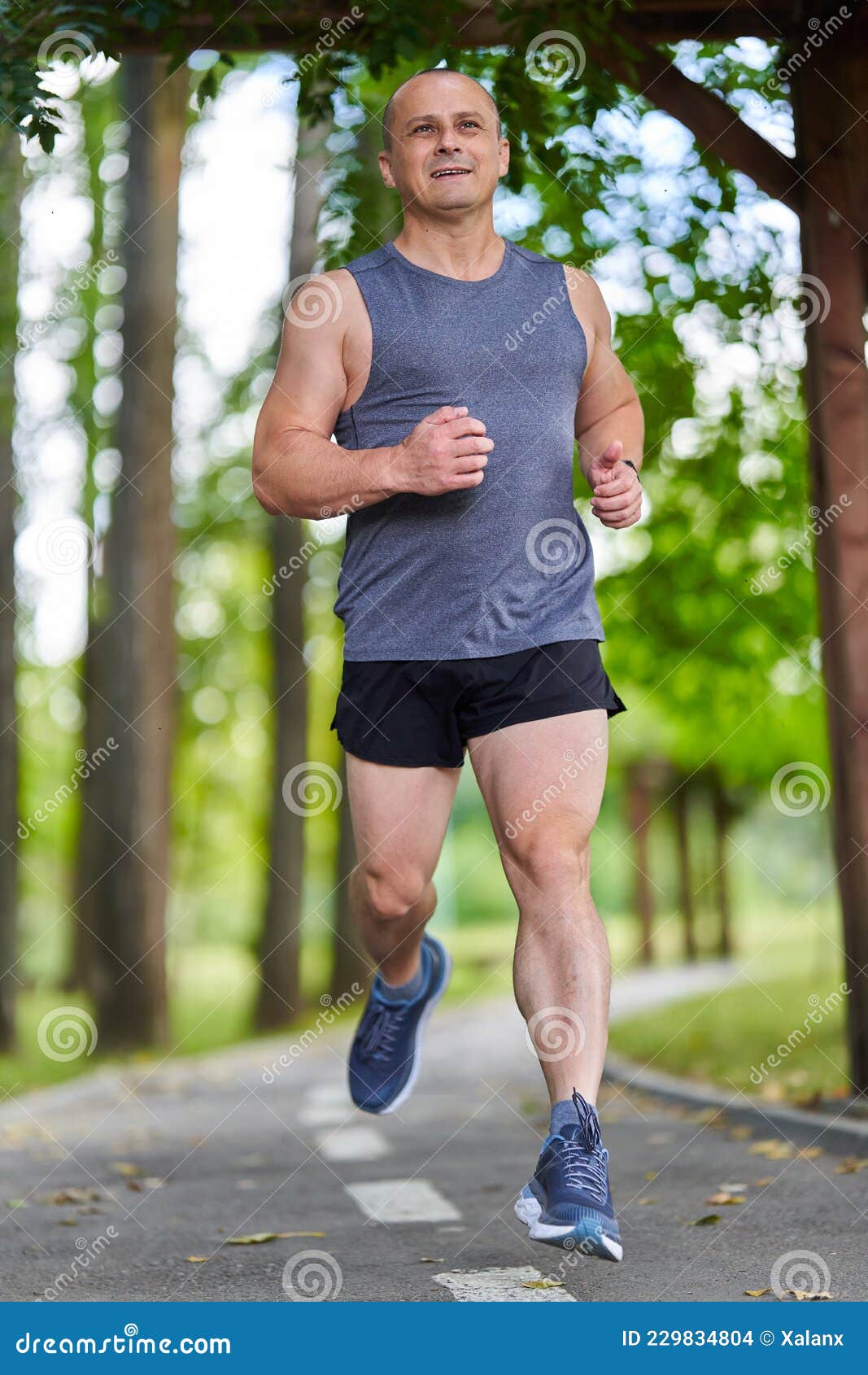 Long Distance Runner Training in the Park Stock Photo - Image of grass ...
