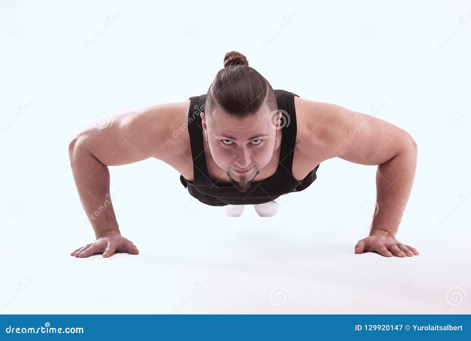 Athletic Man Performs Push-up from the Floor.isolated on White ...