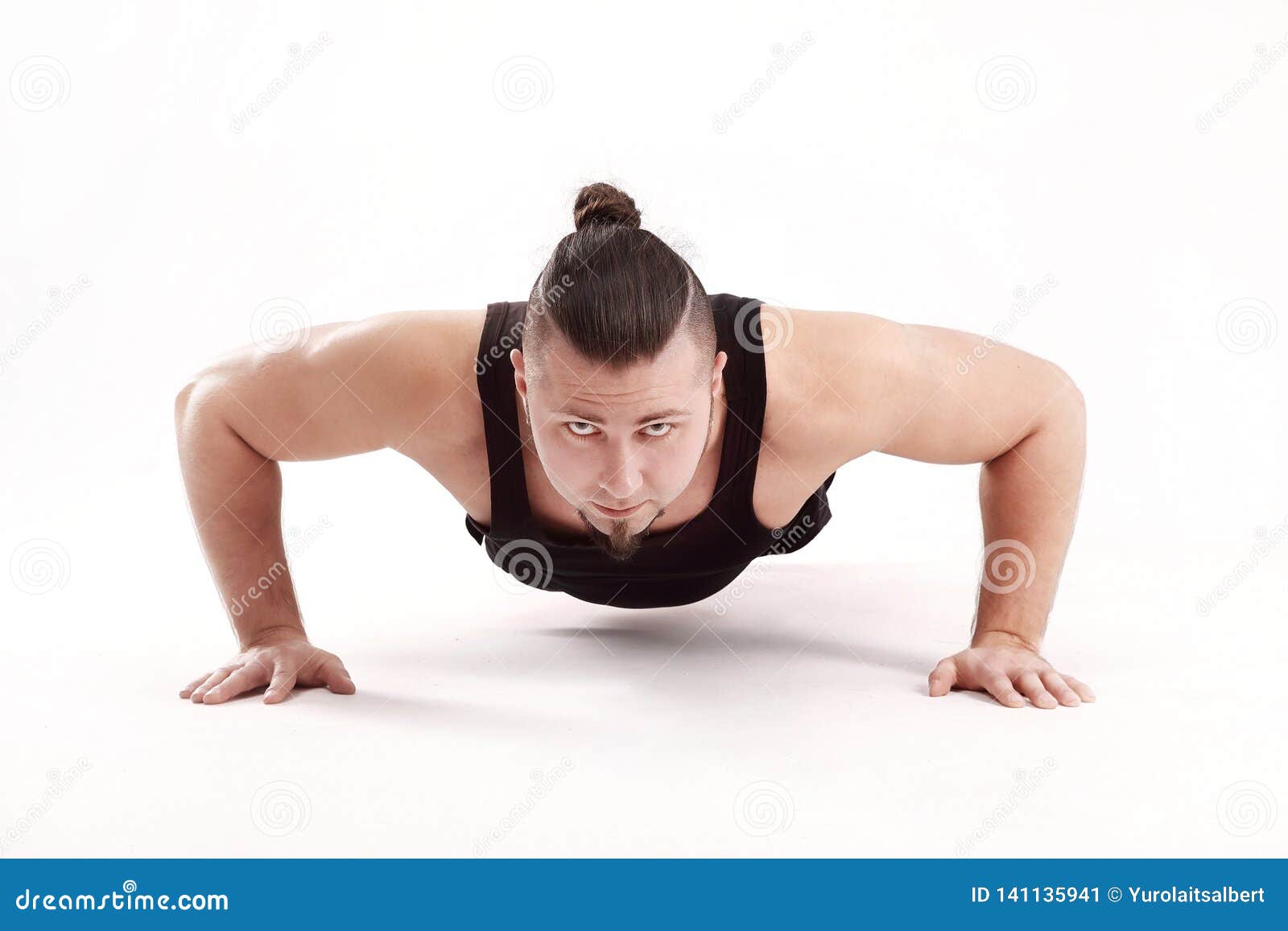 Athletic Man Performs Push-up from the Floor.isolated on White ...