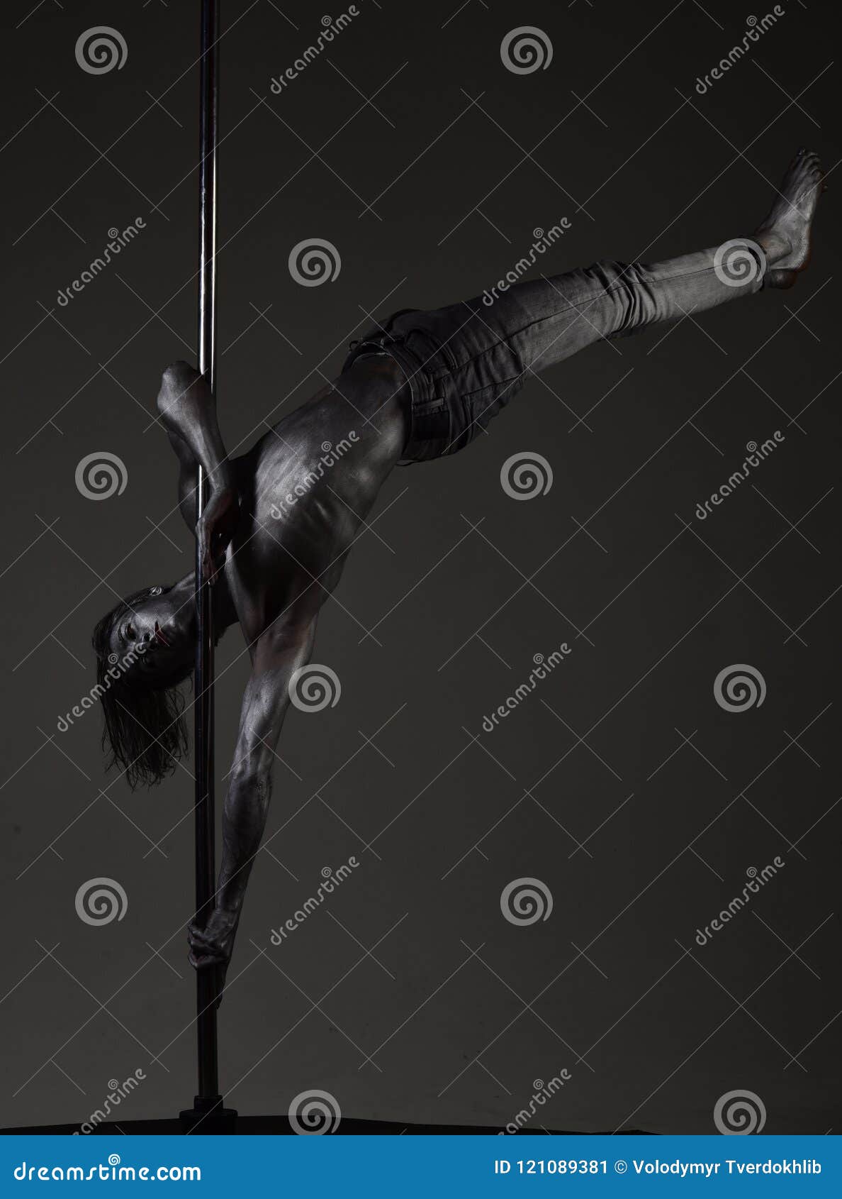 Athletic Man on Pylon. Athletic Man with Silver Painted Body. Stock ...