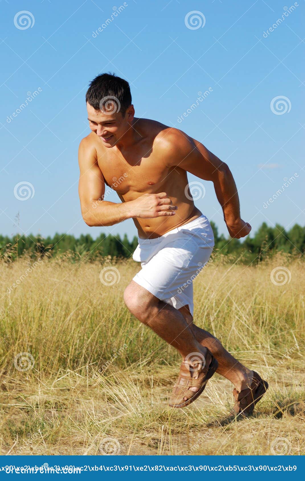 Athletic Man Running in Outdoor Scene Stock Photo - Image of meadow ...