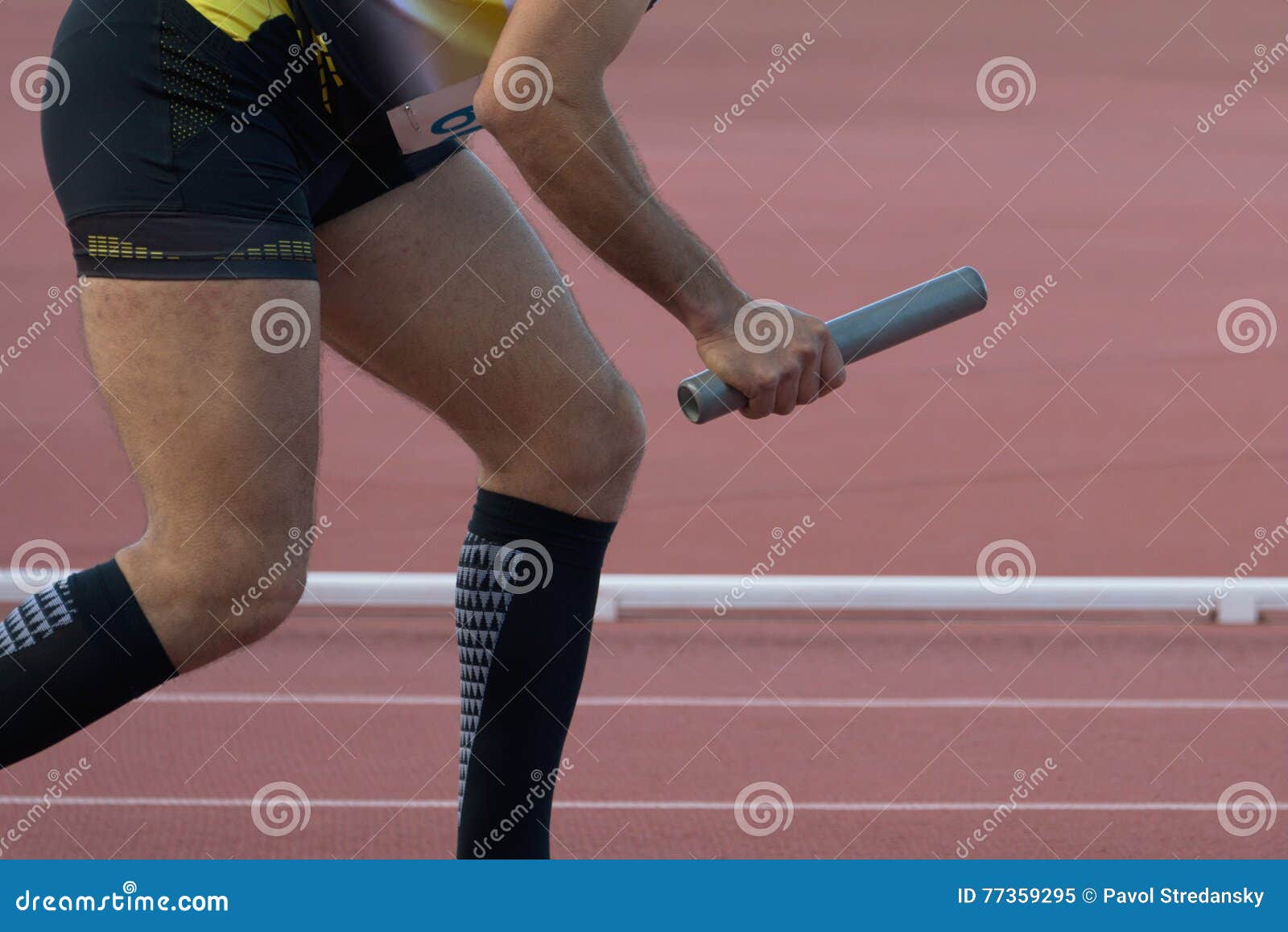 Athletic Man Running a Relays Stock Image - Image of competitive, male ...