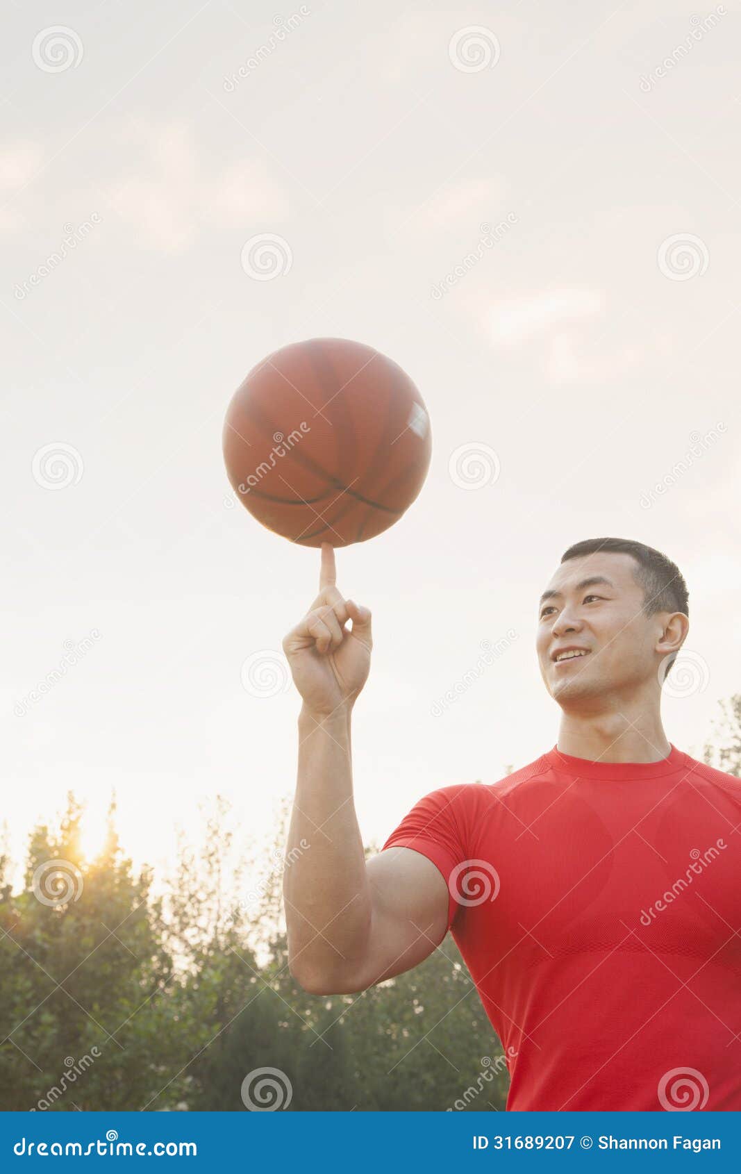 Athletic Man Spinning Basketball Stock Image - Image of lifestyle ...