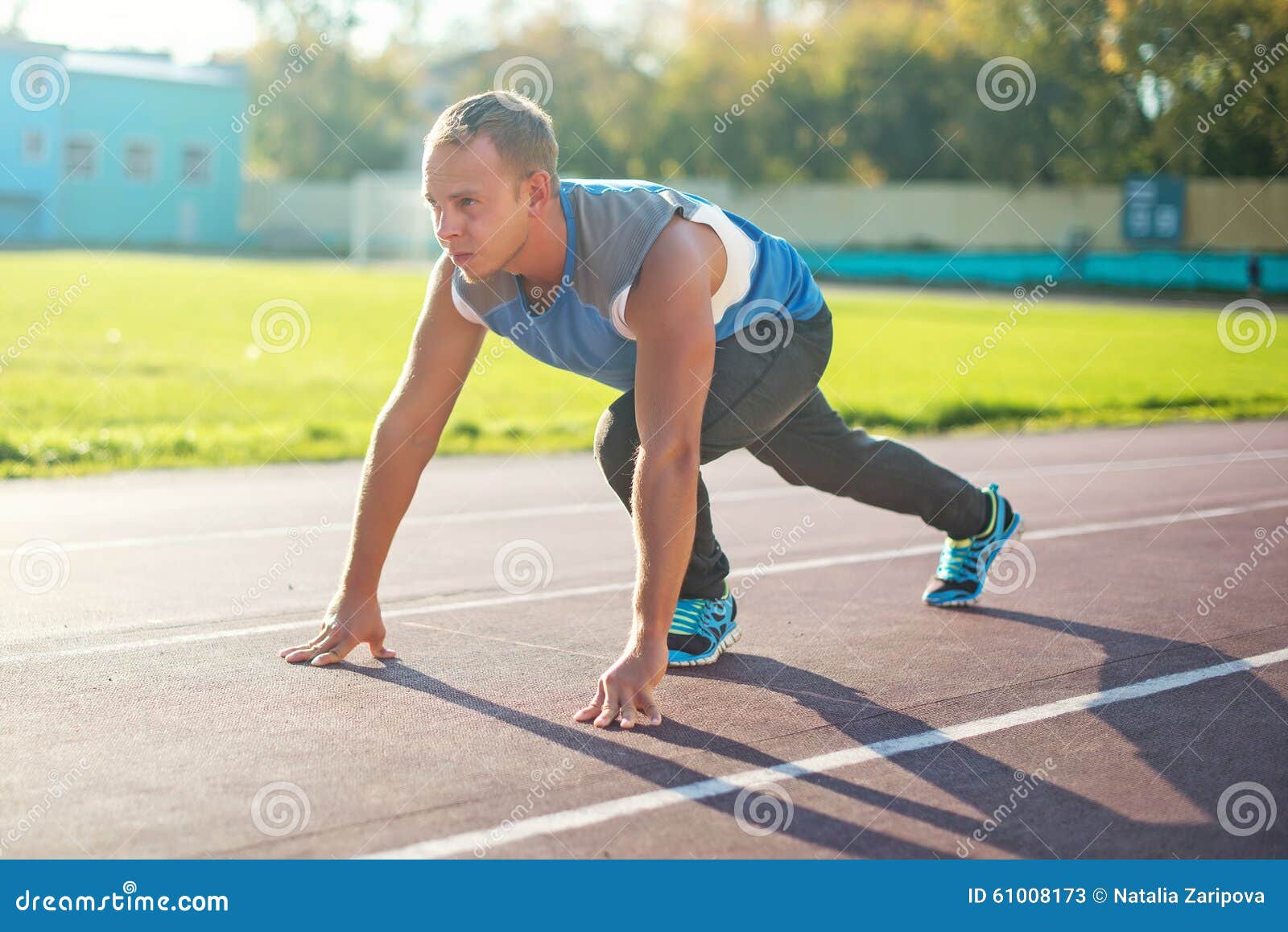 Athletic Man Standing in Posture Ready To Run on a Treadmill Stock ...