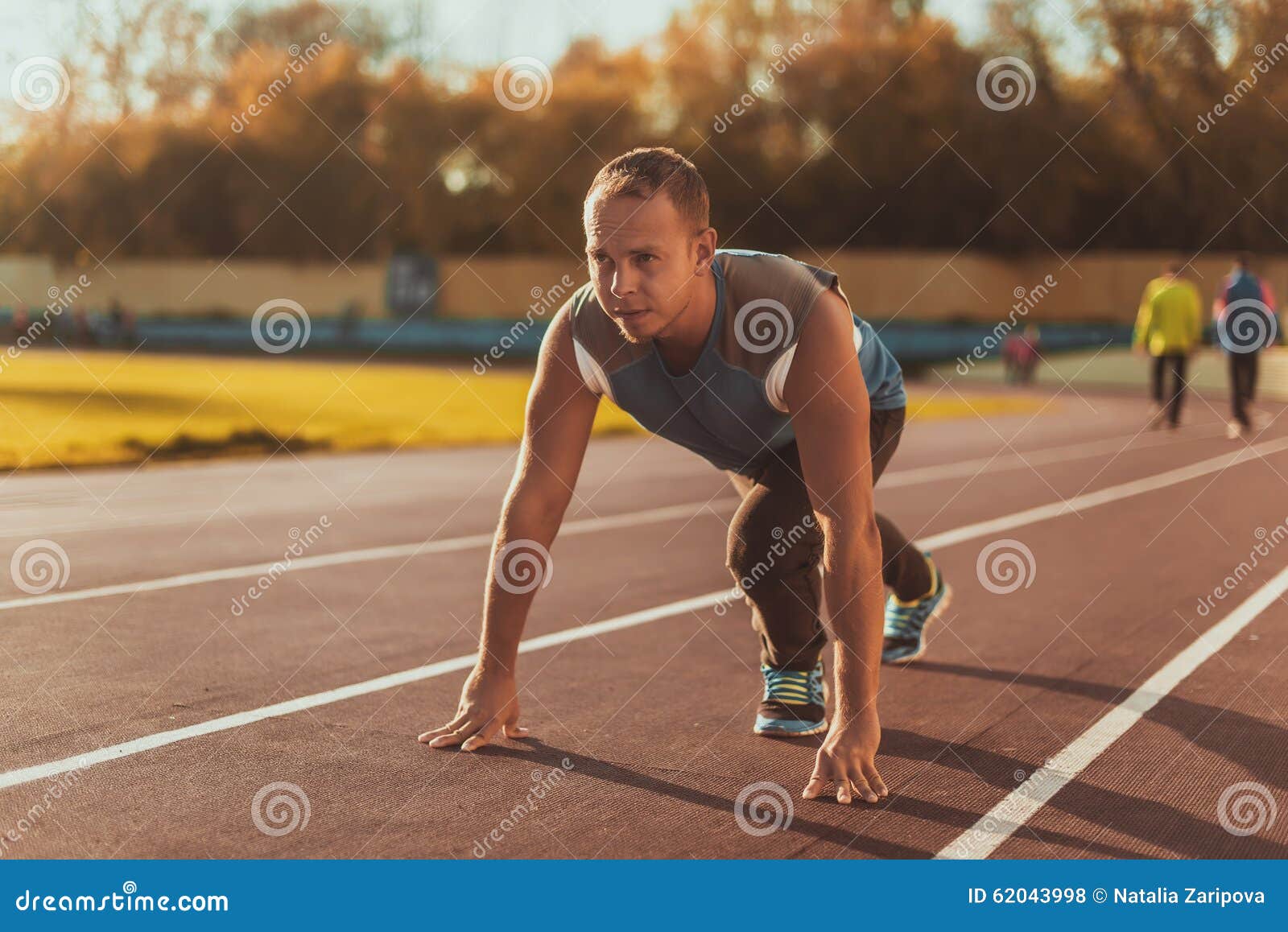 Athletic Man Standing in Posture Ready To Run on a Treadmill Stock ...
