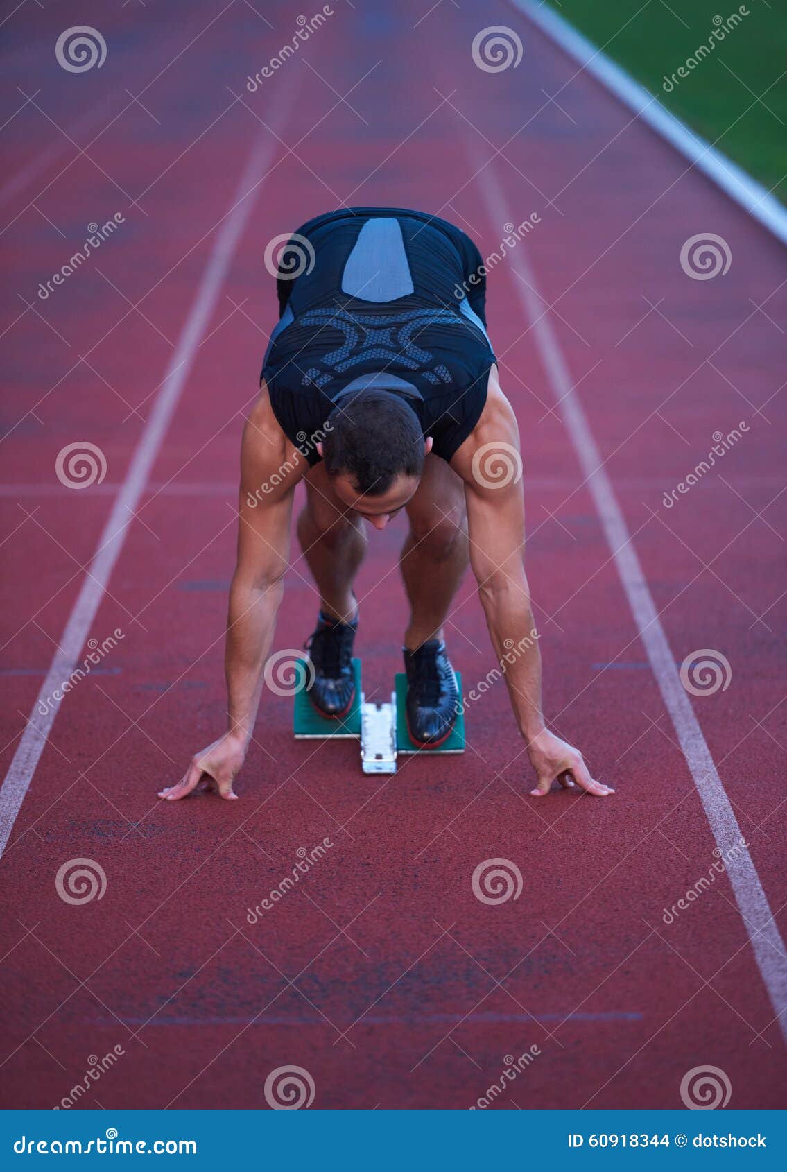 Athletic man start stock photo. Image of action, racetrack - 60918344