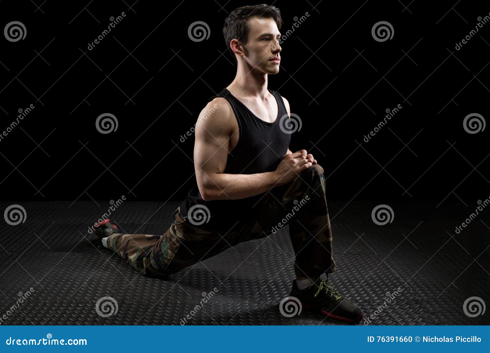 Athletic Man Stretching stock photo. Image of legs, stretch - 76391660