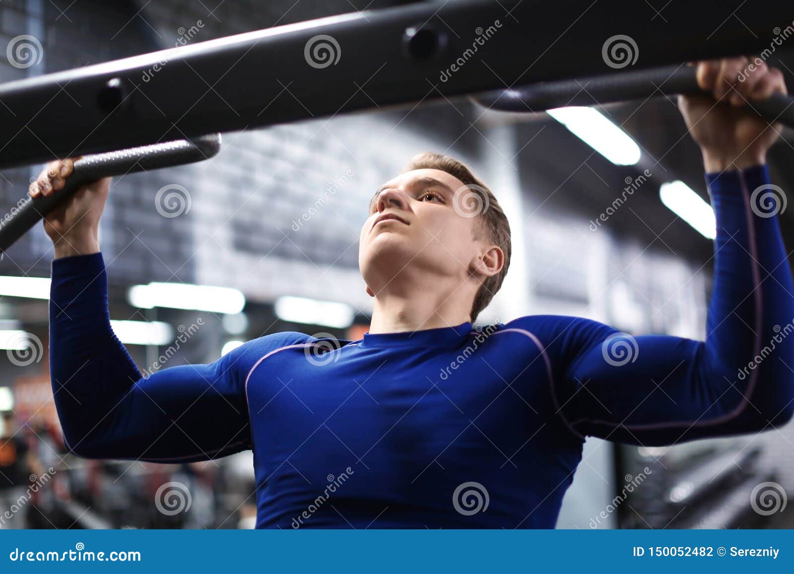 Athletic Man Training in Modern Gym Stock Photo - Image of sport, slim ...