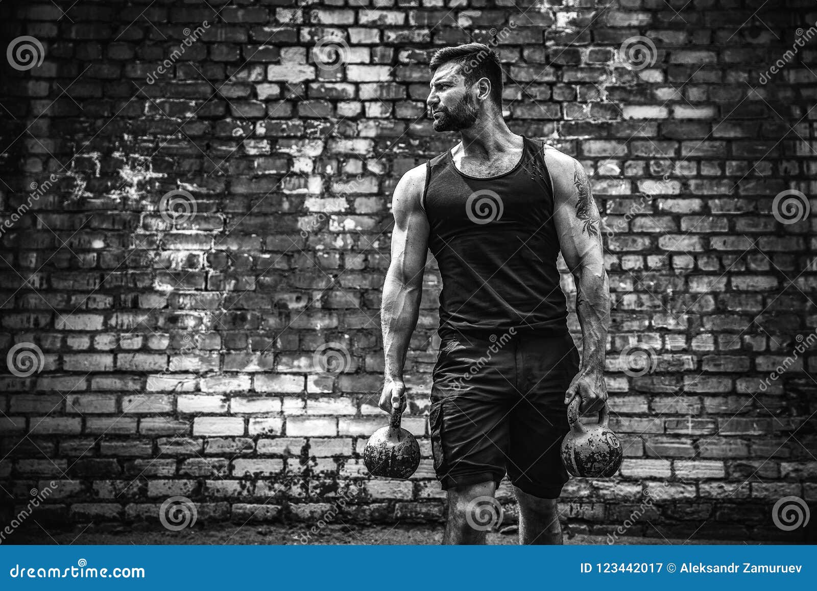 Athletic Man Working Out with a Kettlebell. Strength and Motivation ...