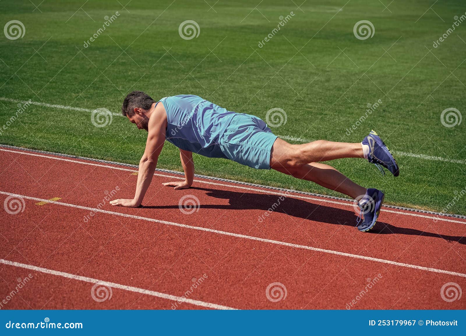 Athletic Muscular Man Doing Plank Outdoor on Stadium, Core Stock Image ...