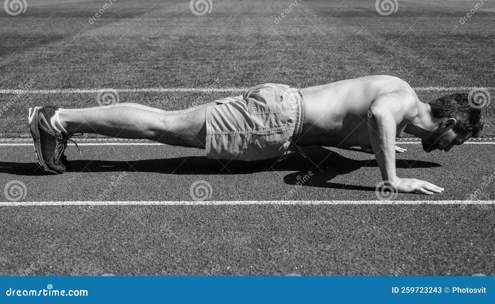 Athletic Muscular Man Doing Plank Outdoor on Stadium, Core Stock Image ...