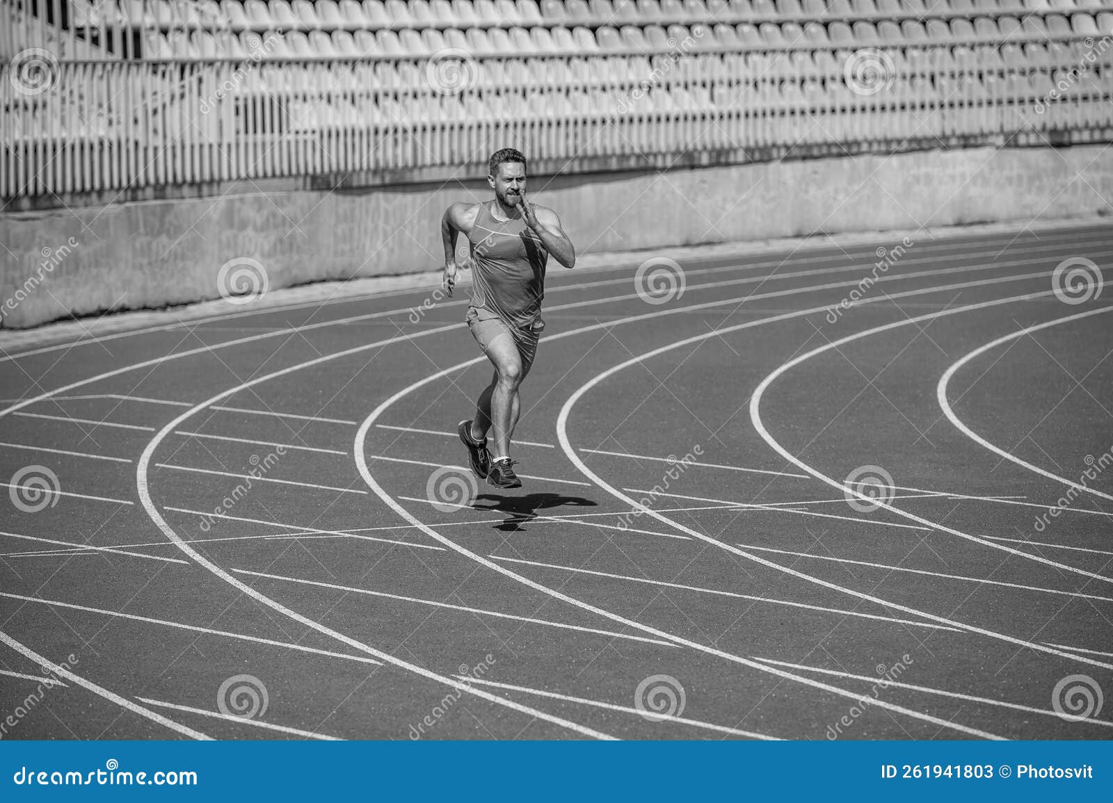 Athletic Muscular Man Runner Running on Stadium, Speed Stock Image ...