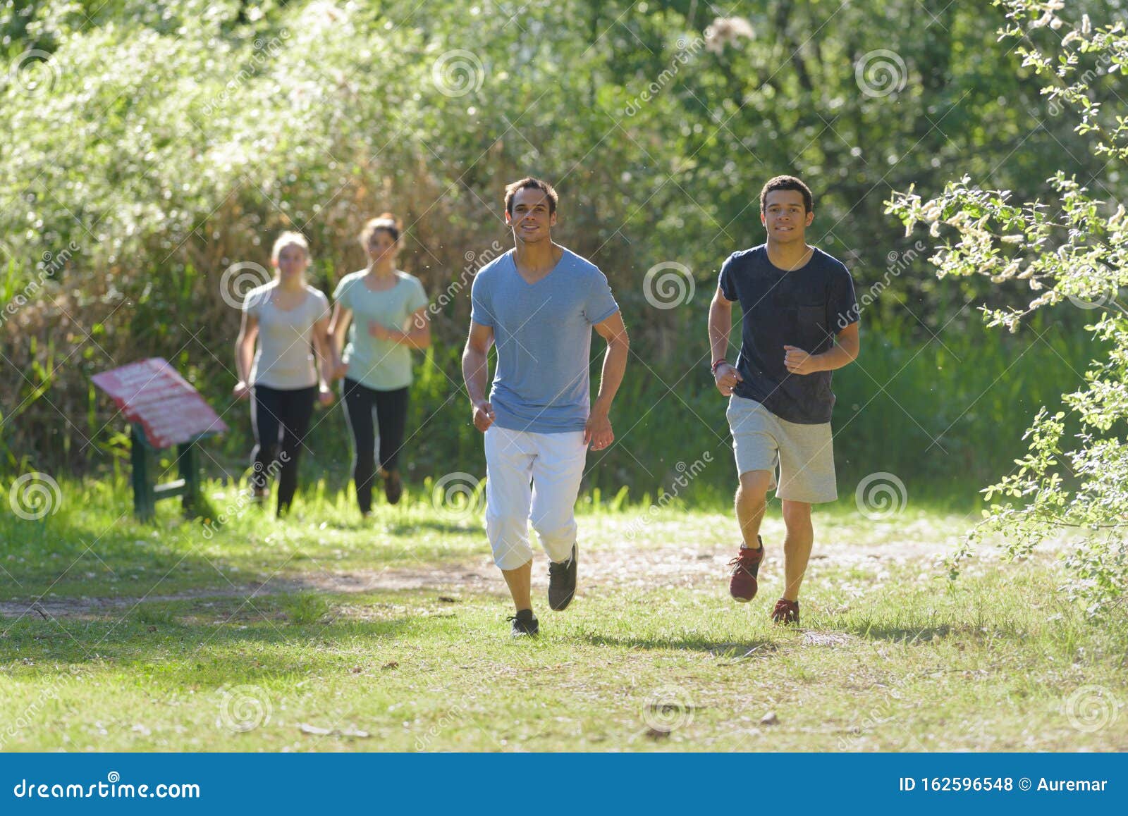 Athletic People Jogging in Nature Stock Photo - Image of human, energy ...