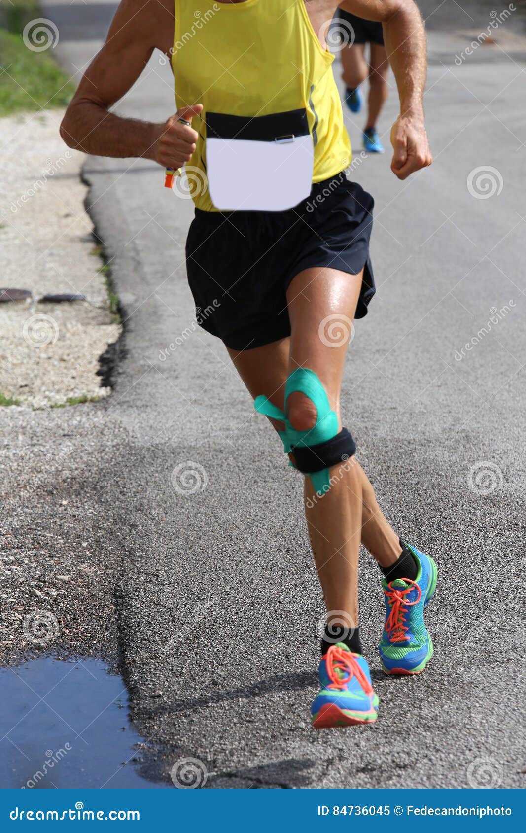 Athletic Runner with Elastic Band at the Knee Running Fast Stock Image ...