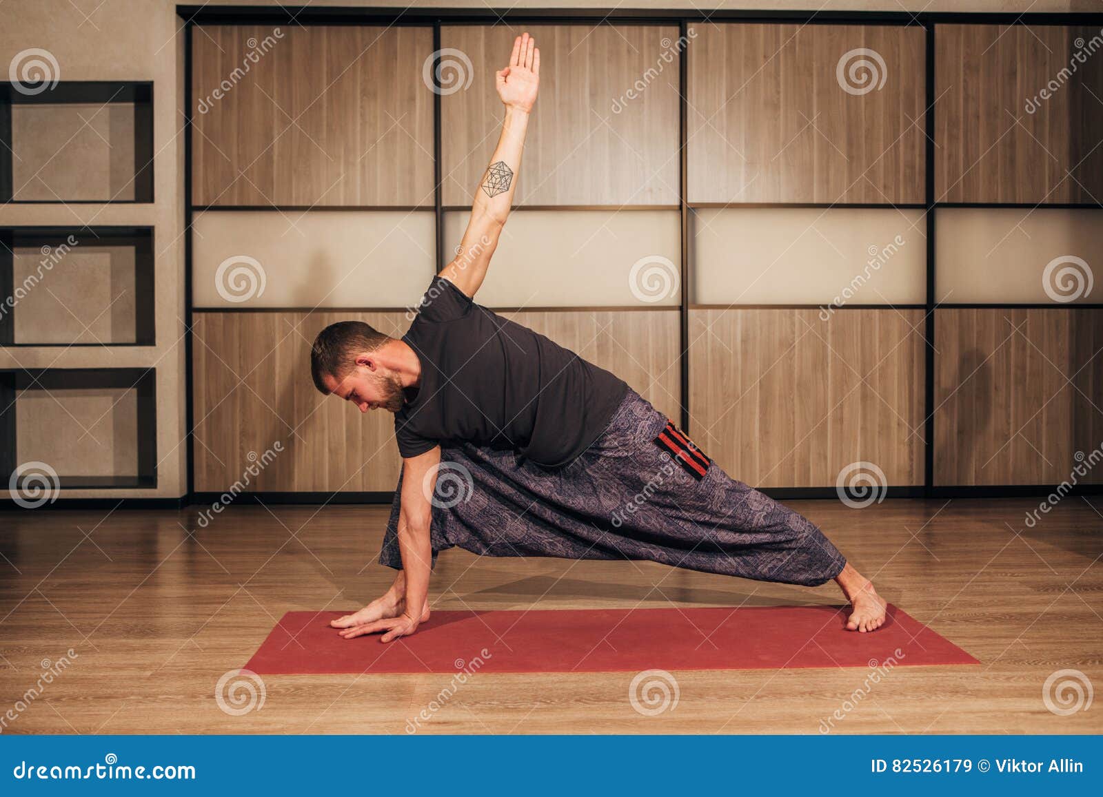 Athletic Strong Man Practicing Difficult Yoga Pose. Stock Image - Image ...