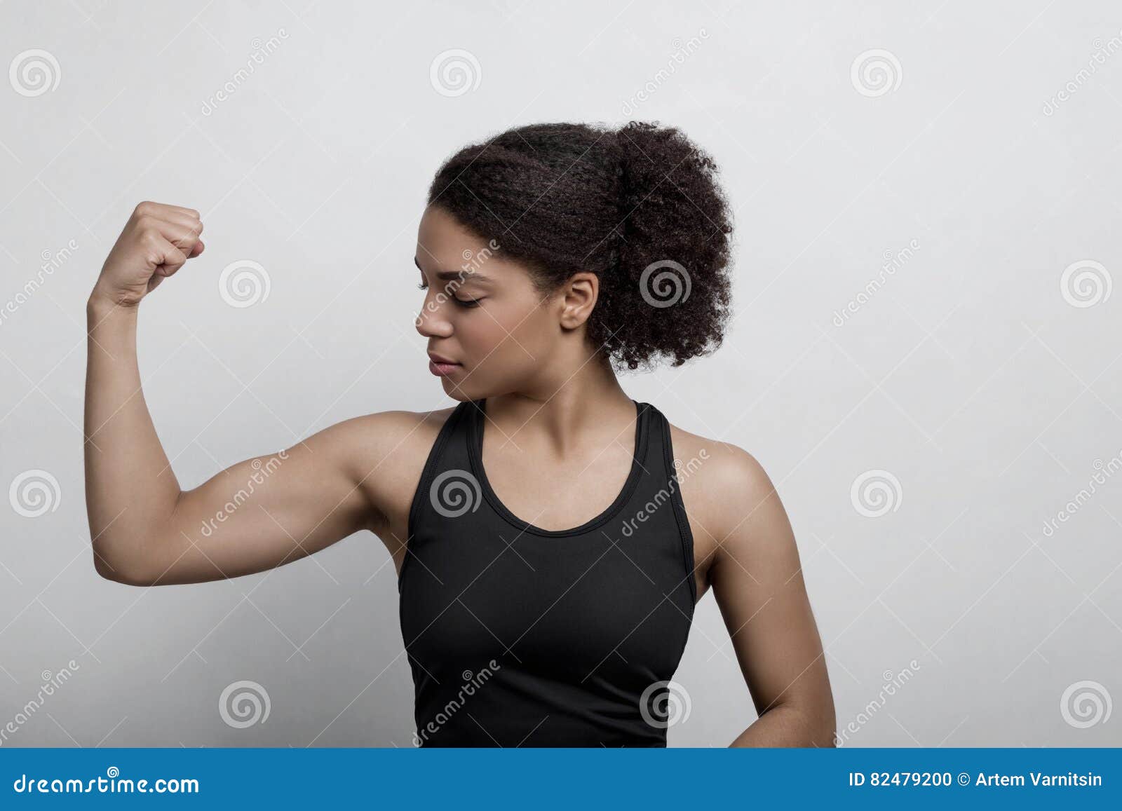 Athletic Woman Flexing Her Arm Muscle Stock Photo - Image of lifestyle ...