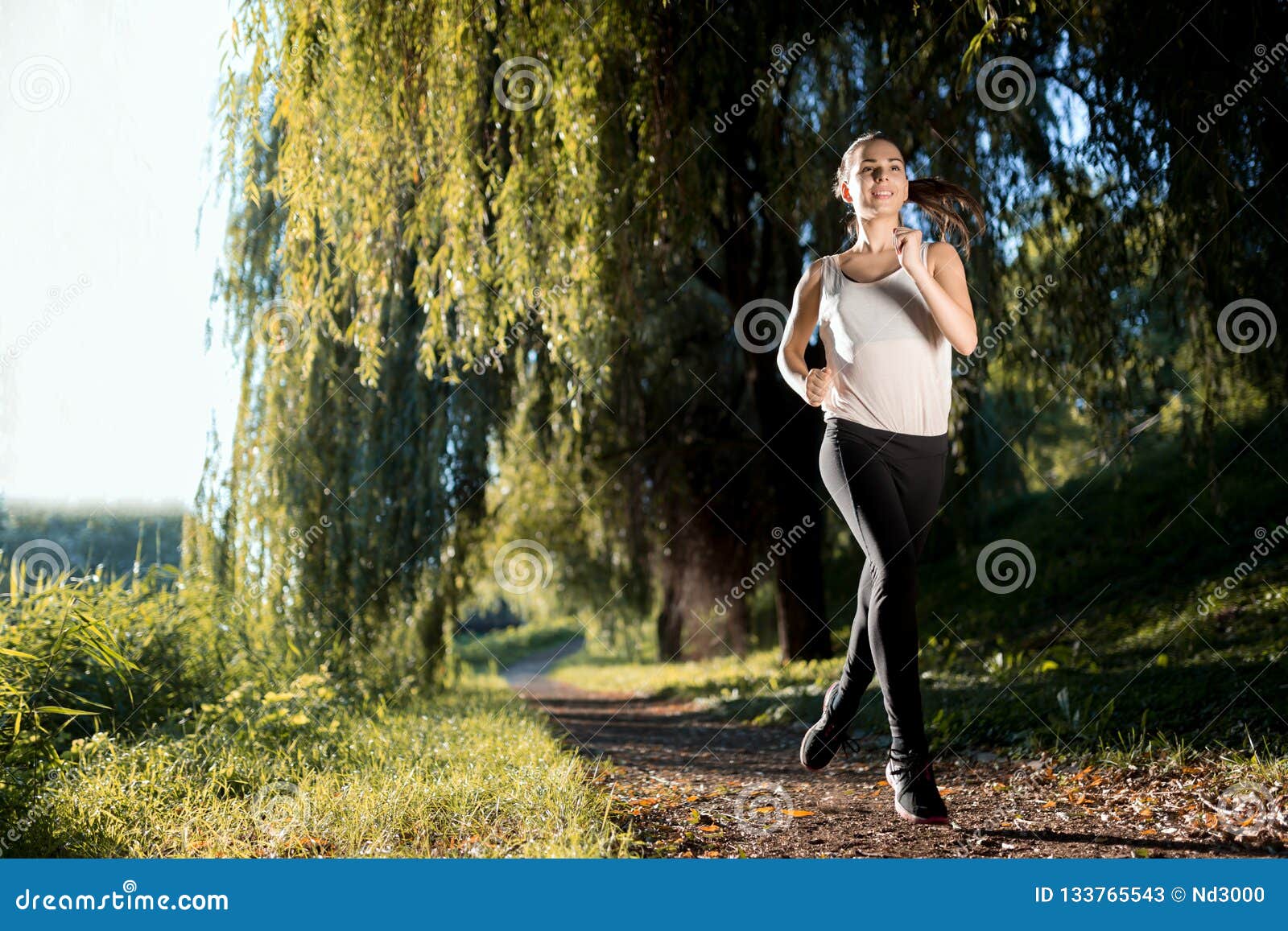 Athletic Woman Jogging in Nature Stock Image - Image of exercise ...