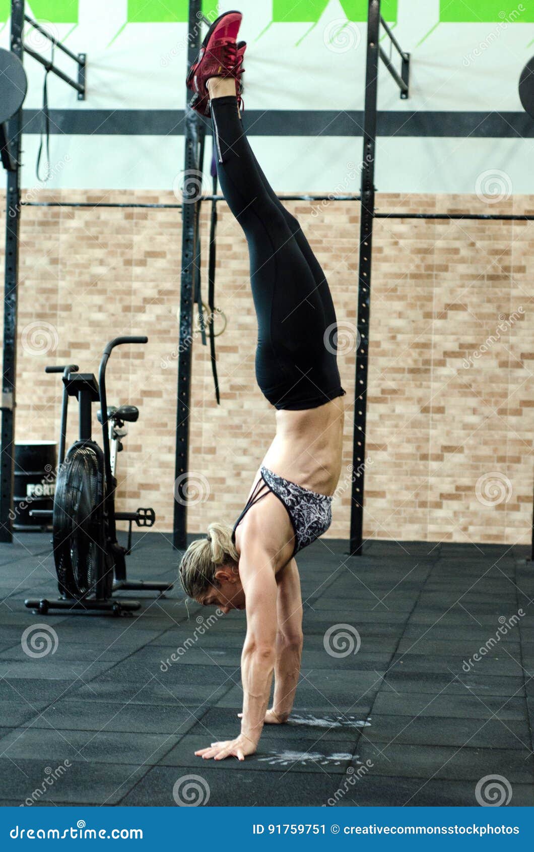 Athletic Woman Performing Handstand Picture. Image: 91759751
