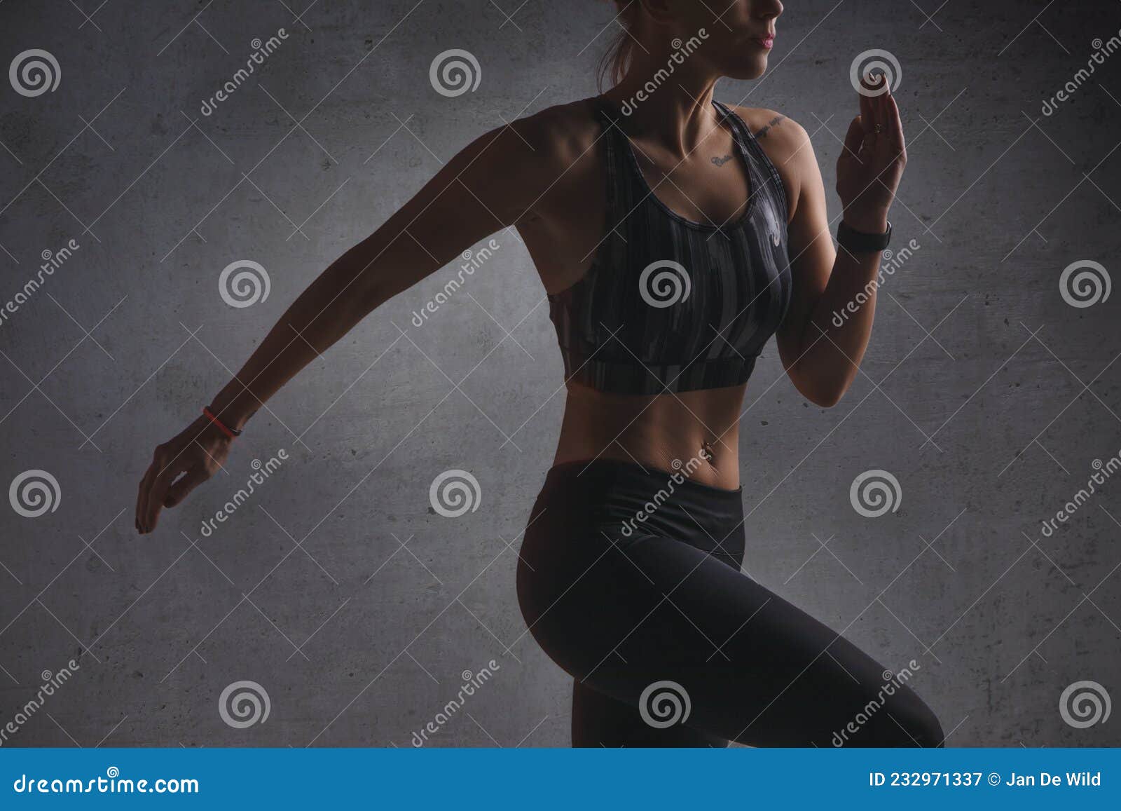 Athletic Woman Running Forward in the Studio Stock Image - Image of ...