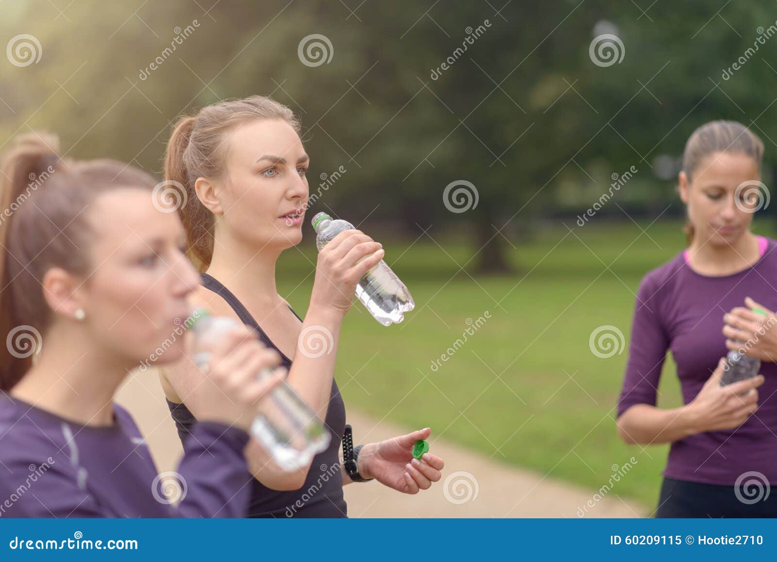 Athletic Women Drinking Water after an Exercise Stock Image - Image of ...